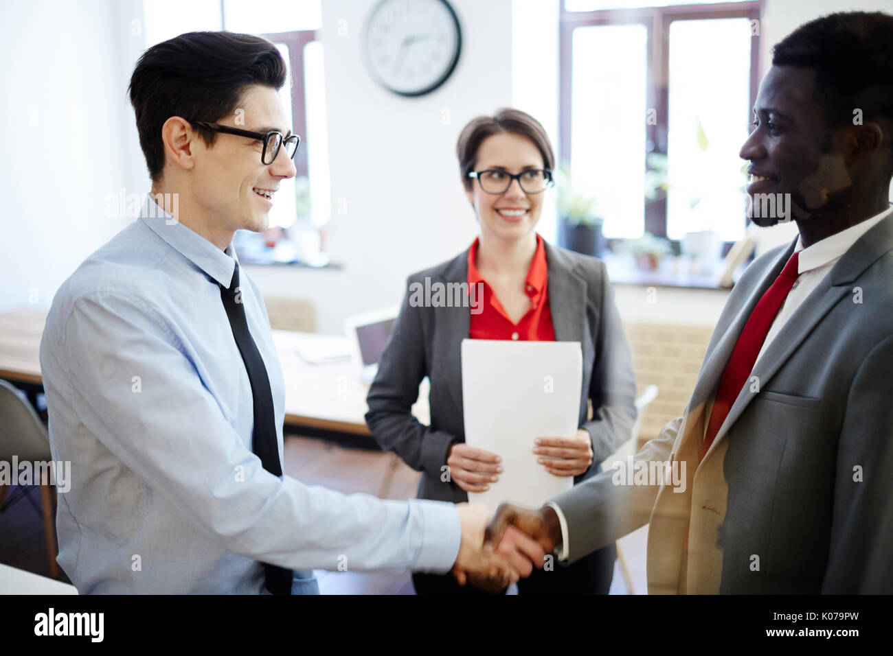 Greeting new partner Stock Photo - Alamy