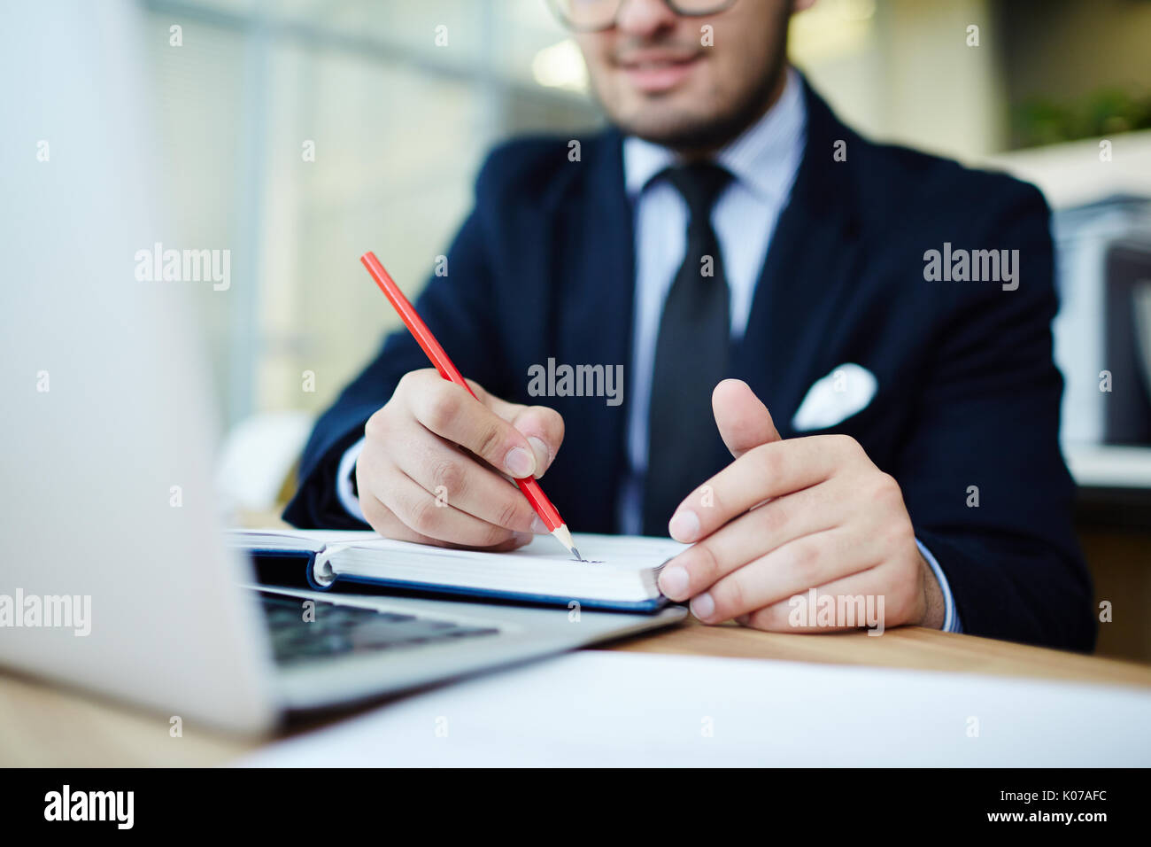 Writing plan of working day Stock Photo - Alamy