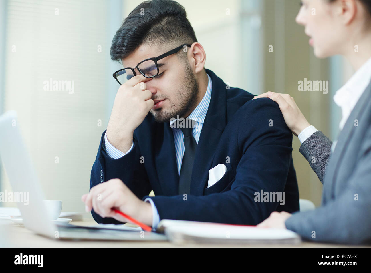 Support of colleague Stock Photo - Alamy