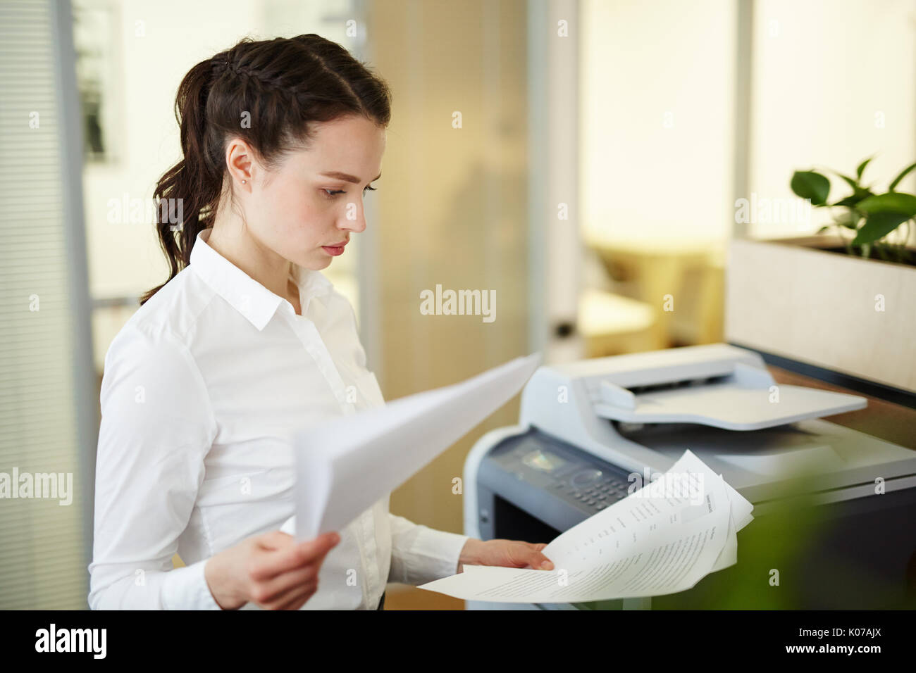Secretary at work Stock Photo - Alamy