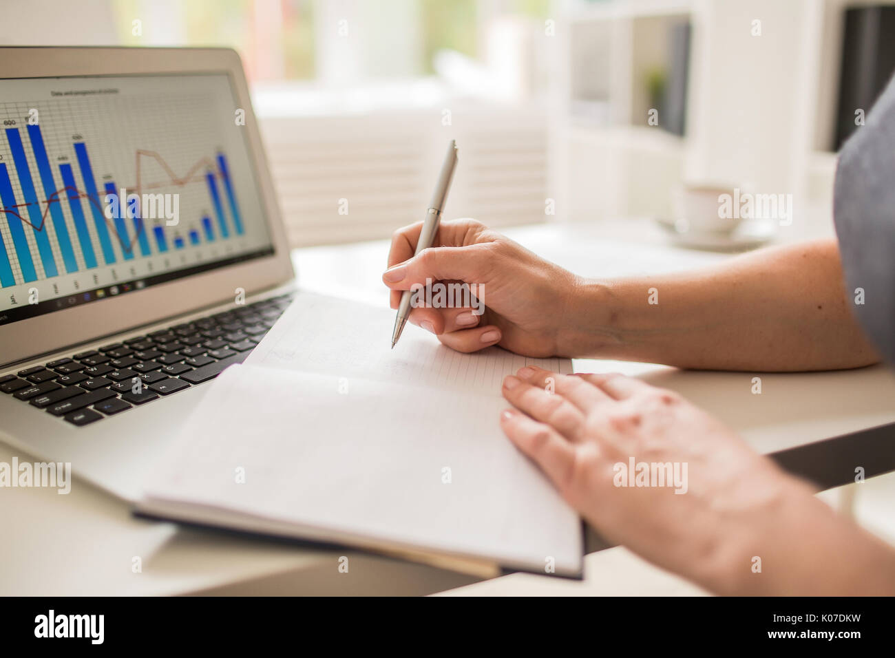 Analyzing Statistics at Work Stock Photo - Alamy