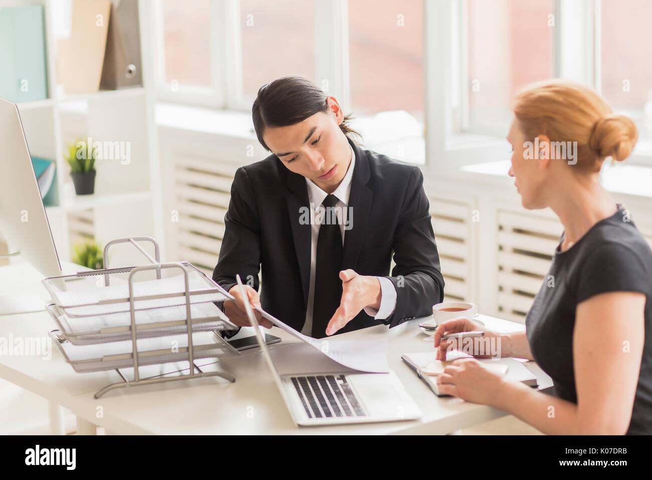 Business Team Analyzing Work Results Stock Photo - Alamy