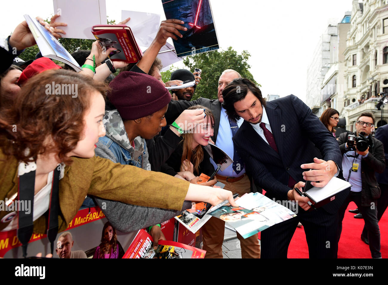 Adam Driver signs autographs for fans during the Logan Lucky UK ...