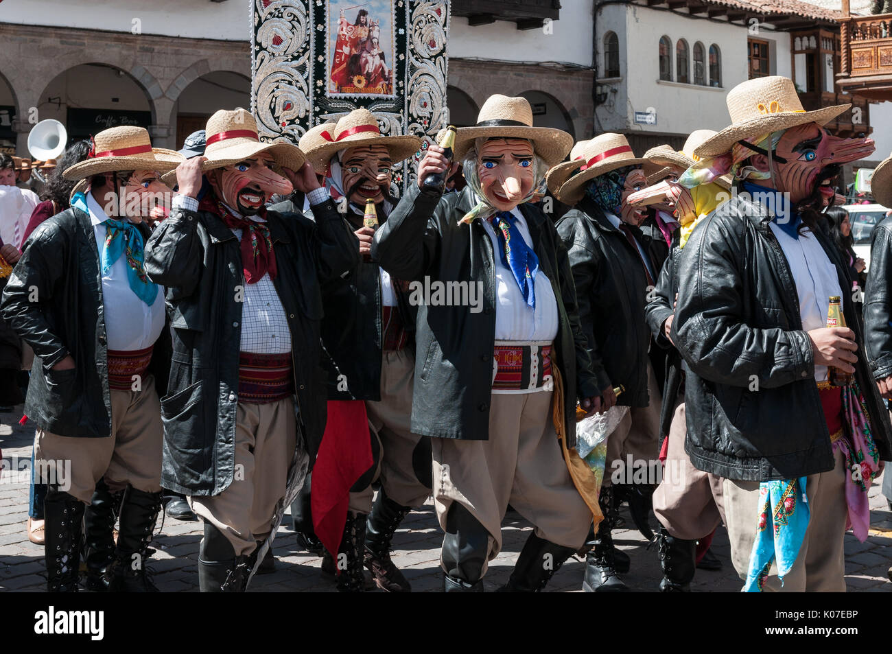 A group of men wearing traditional costumes representing spirit ...