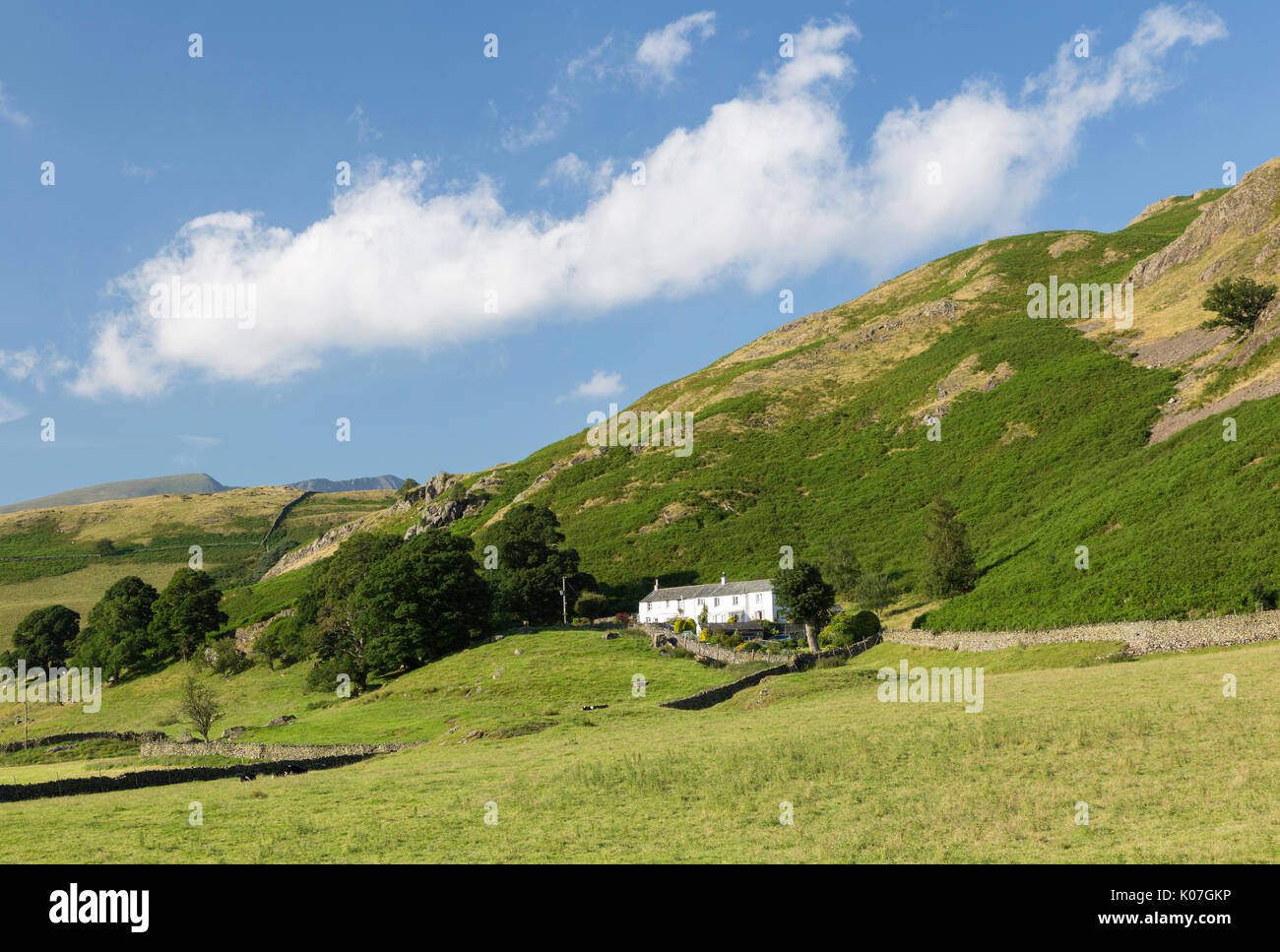 Stone Cottage and Piper House, nestled below High Rigg, south-east of ...
