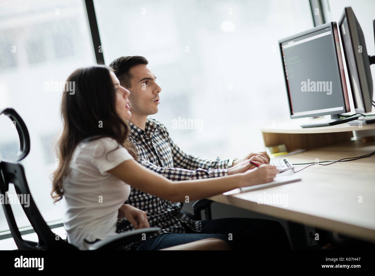 Business woman pointing computer hi-res stock photography and images ...