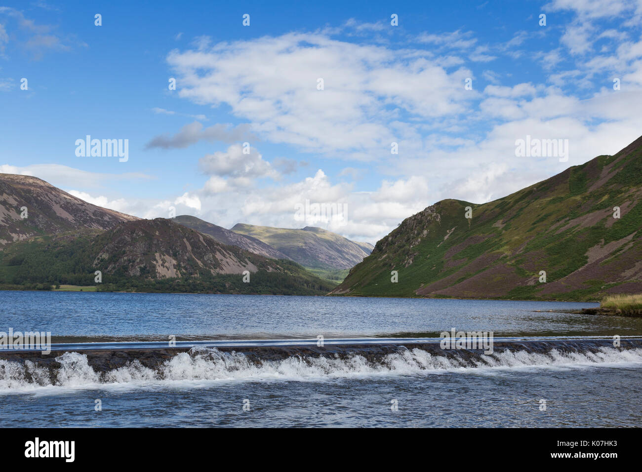 The view over the weir at the north-western end of Ennerdale Water ...