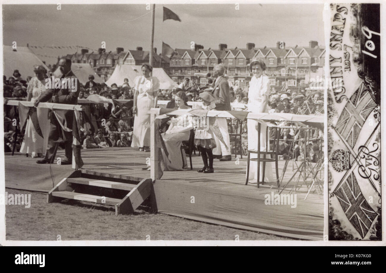 Announcing the winner of a beauty pageant - South Coast Stock Photo - Alamy