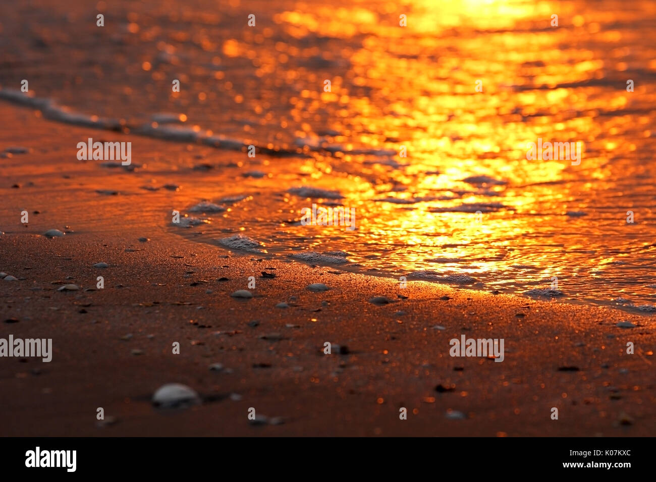 Beautiful sand beach when sunlight expose to the beach in early morning ...