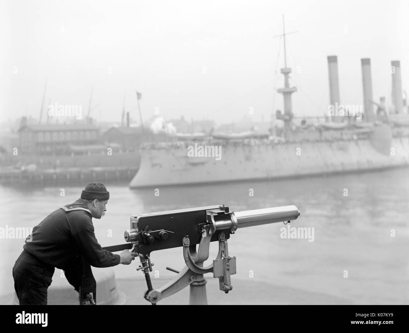 Sailor firing machine gun at Brooklyn Navy Yard, New York Ci Stock ...