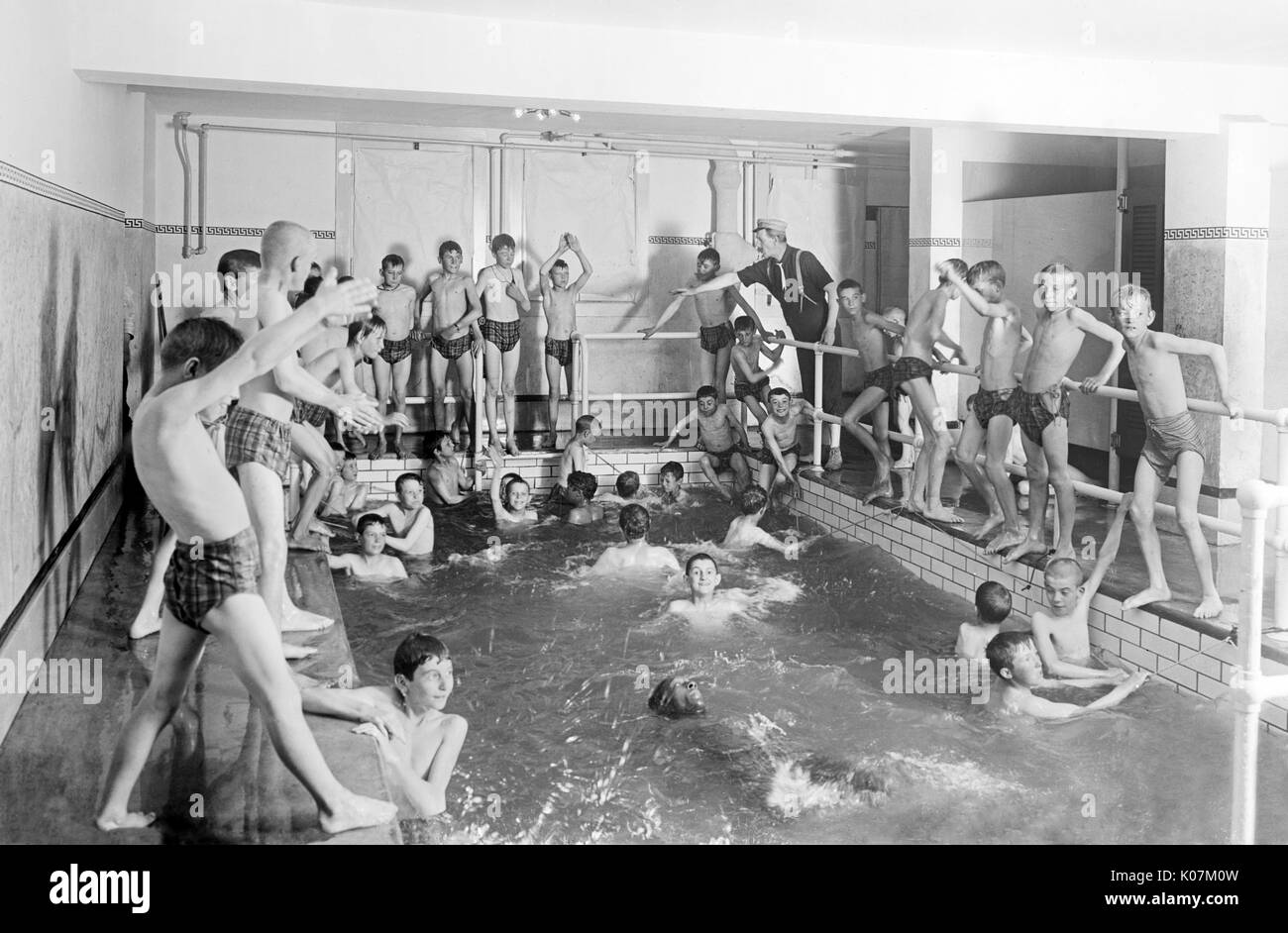 Children swimming in the News Tribune newspaper newsboys' plunge bath ...