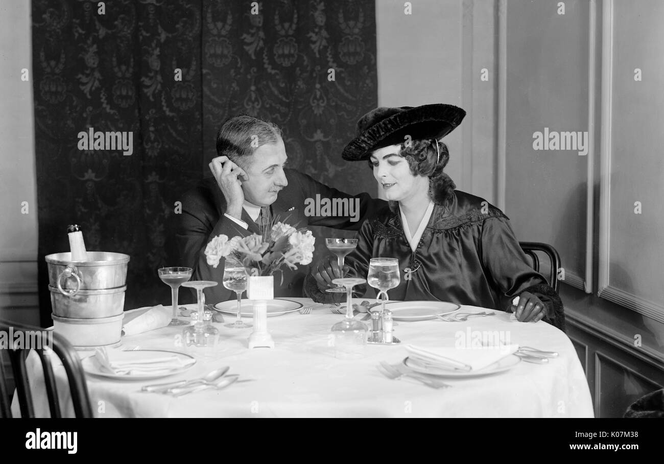 Having supper hi-res stock photography and images - Alamy