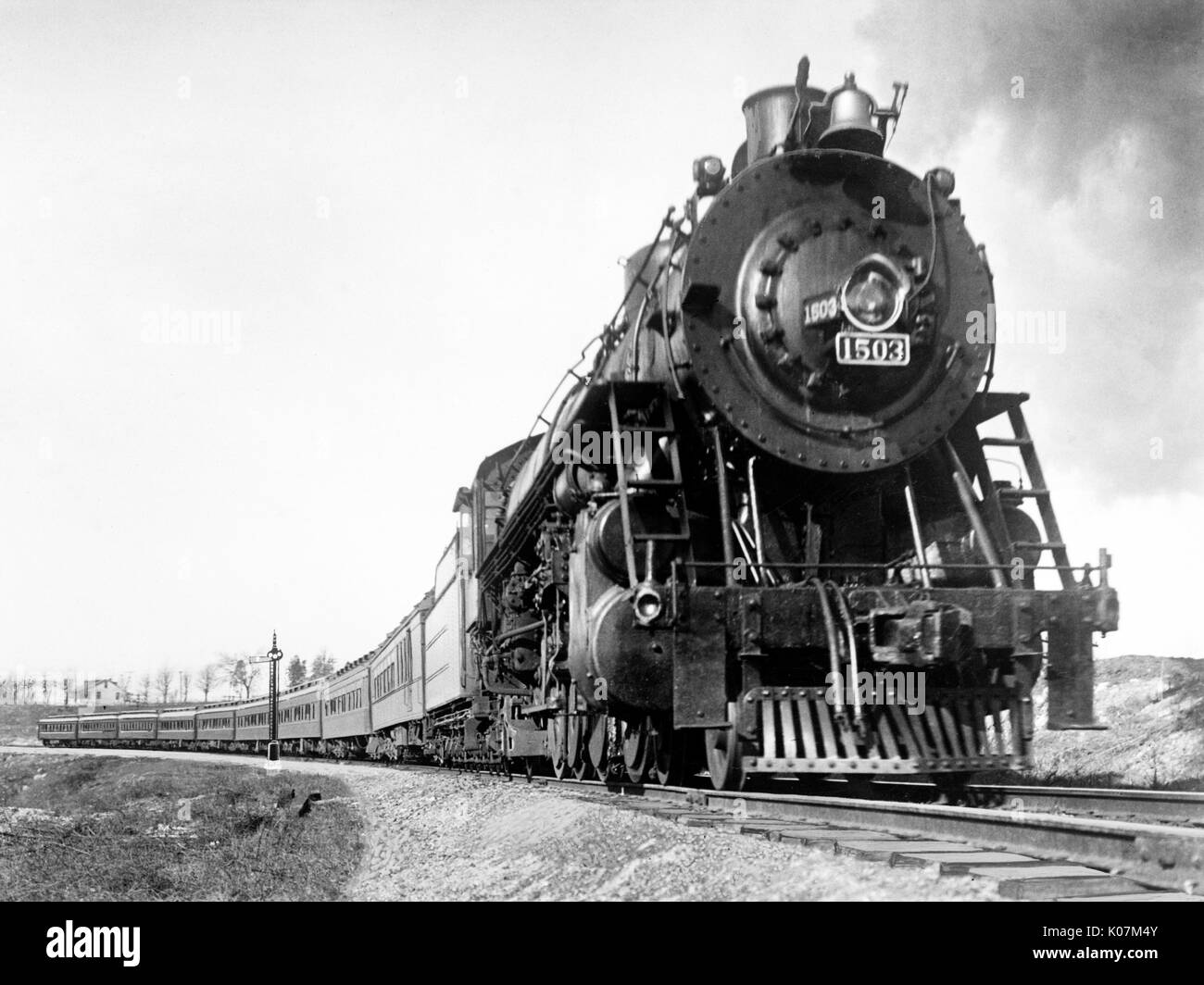 A steam engine on the American railway rounding a curve Stock Photo - Alamy