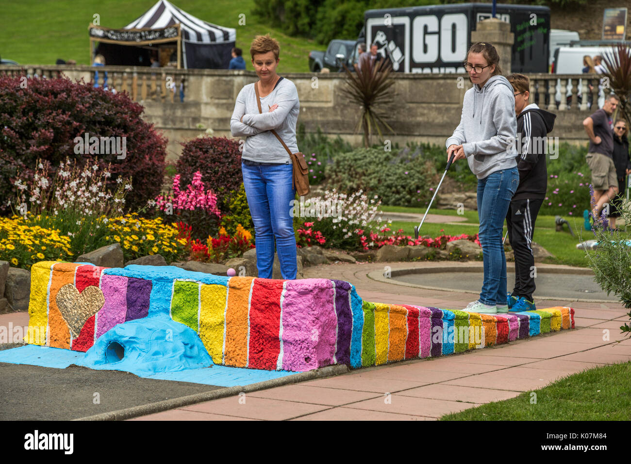 Crazy golf , mum and daughter having fun, UK Stock Photo - Alamy