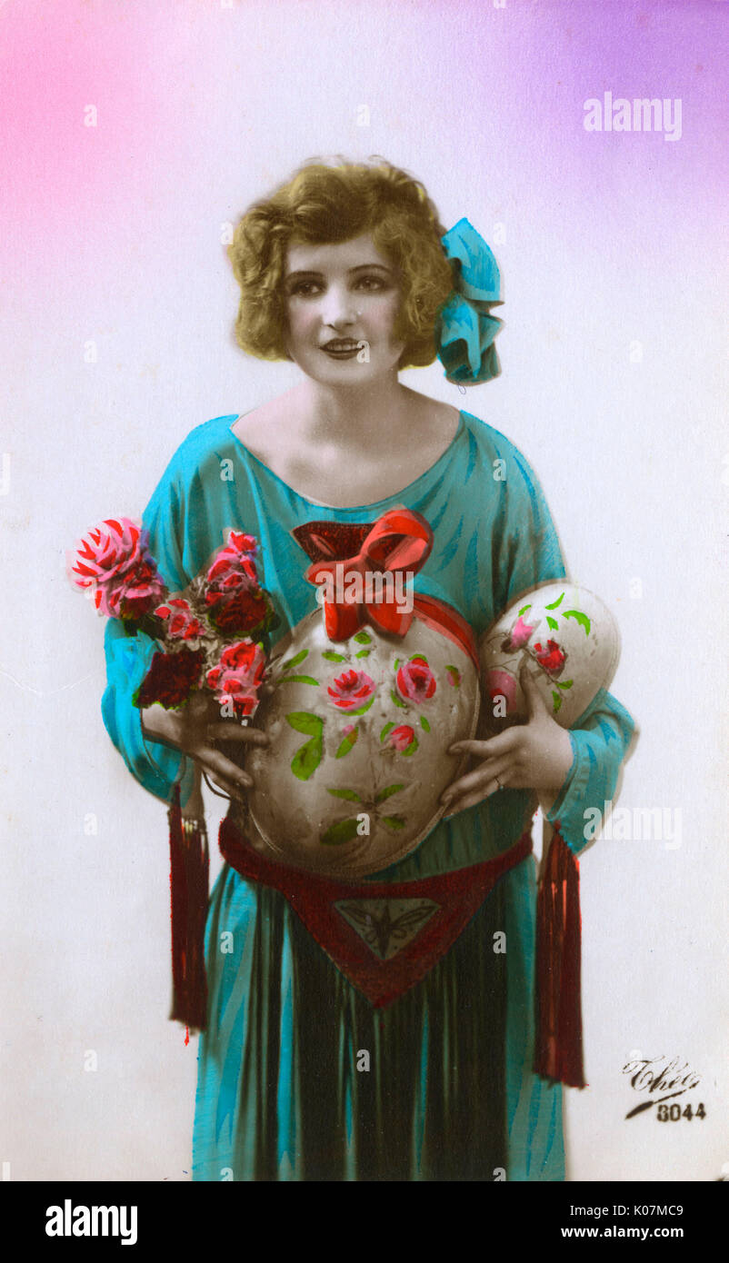 Easter - French model holding giant model eggs Stock Photo - Alamy