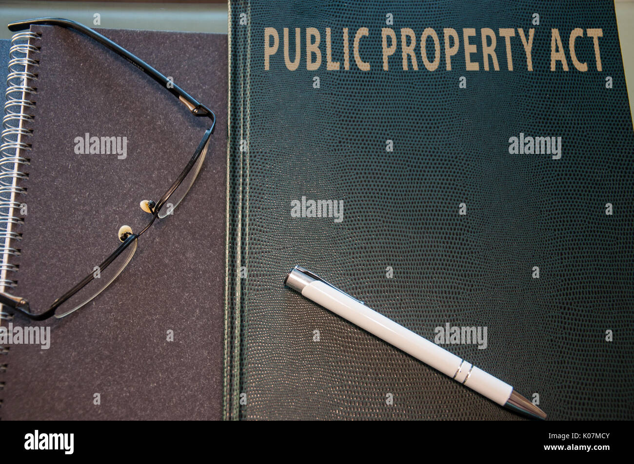 public property act kept in green hard cover Stock Photo - Alamy