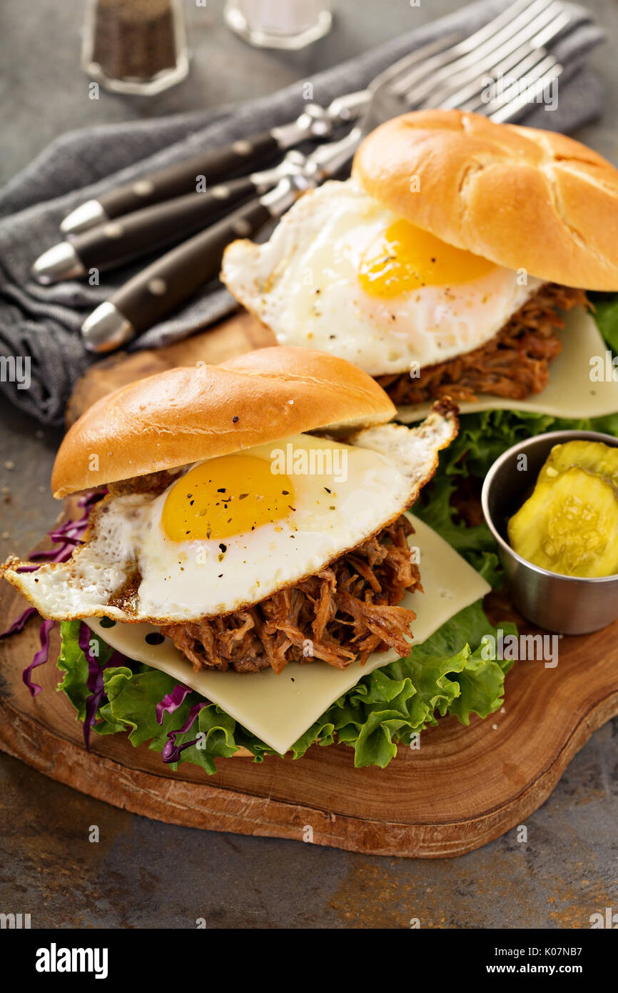 Pulled pork breakfast sandwiches with fried egg Stock Photo - Alamy
