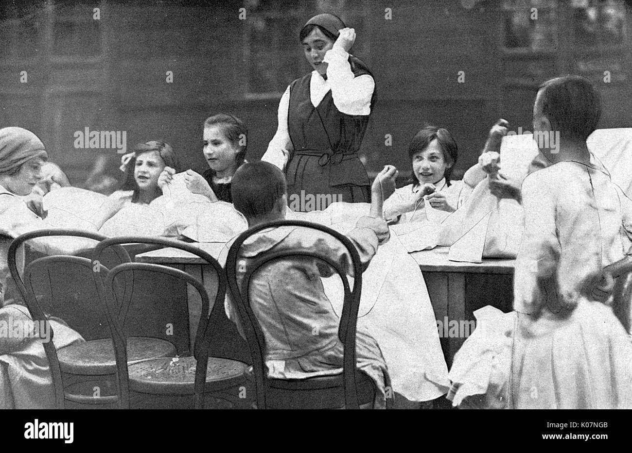 Group women children one Black and White Stock Photos & Images - Alamy