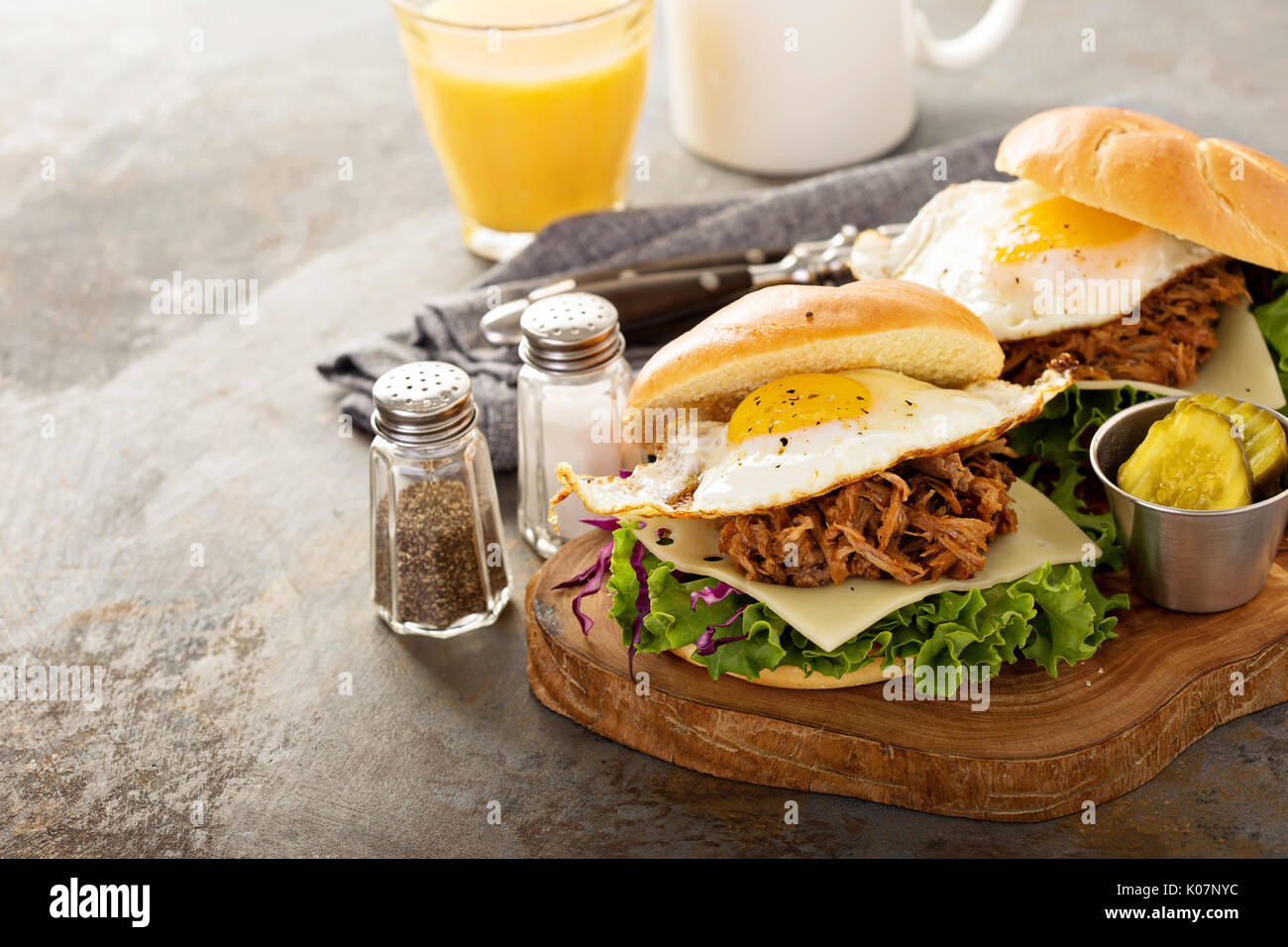 Pulled pork breakfast sandwiches with fried egg Stock Photo - Alamy