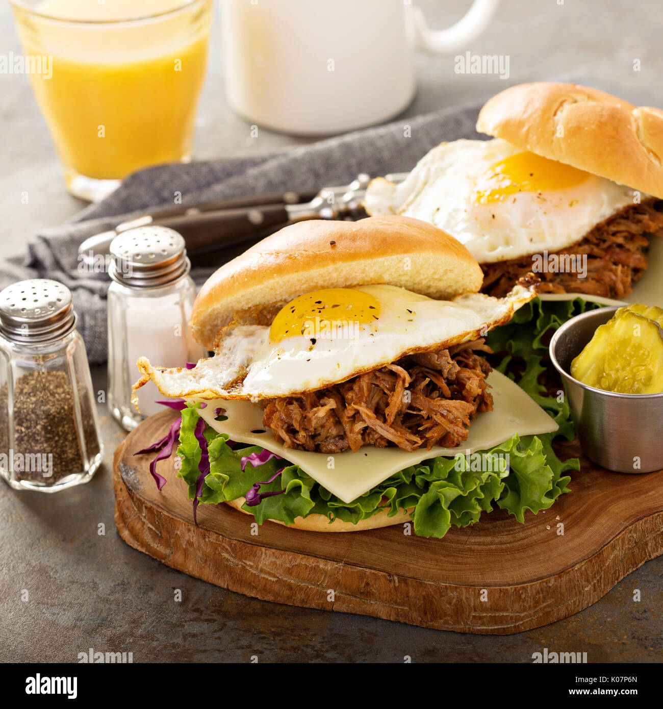 Pulled pork breakfast sandwiches with fried egg Stock Photo - Alamy