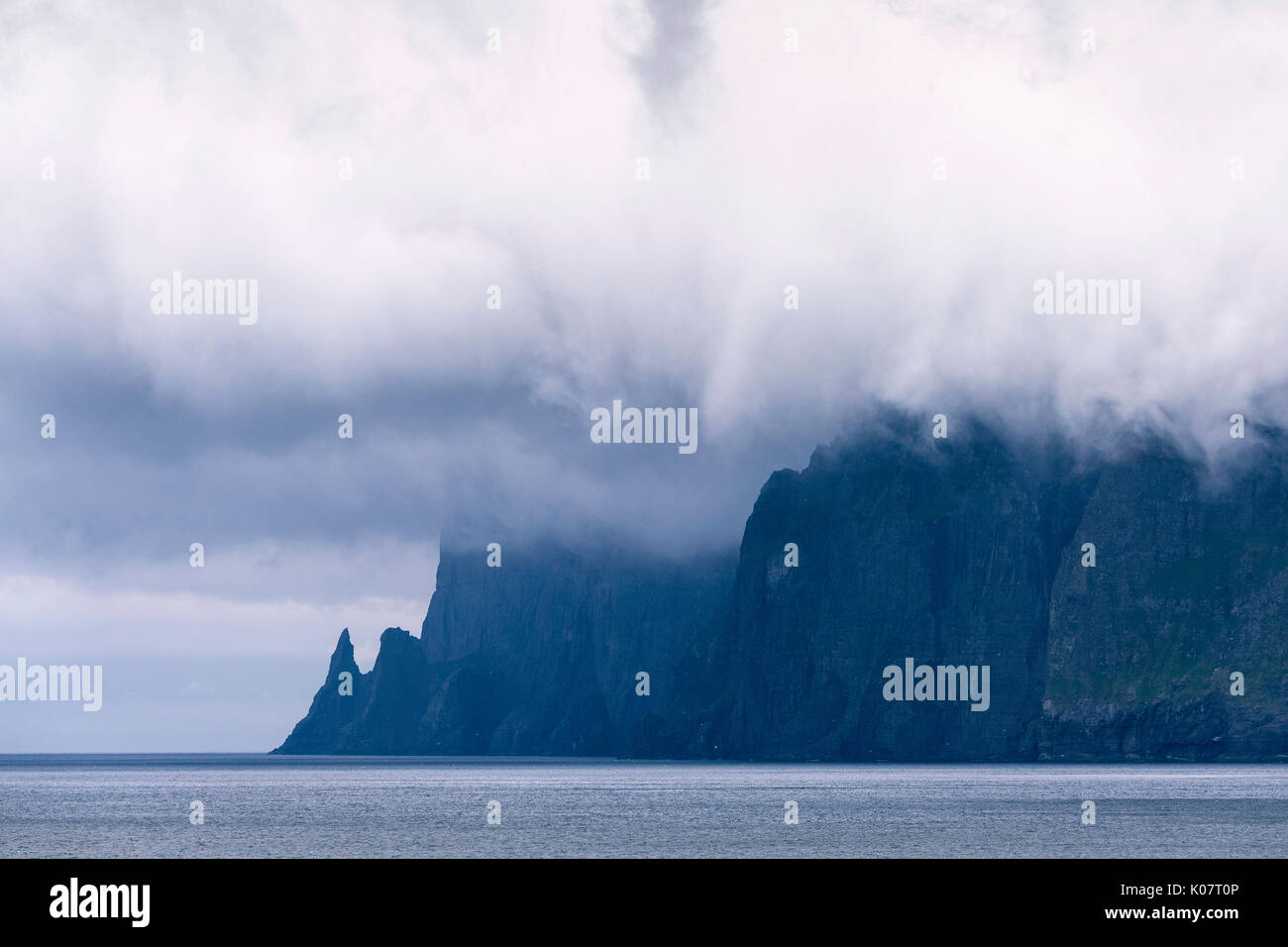 Steep coast near Vestmanna, cloudscape, Streymoy island, Faroe Islands ...