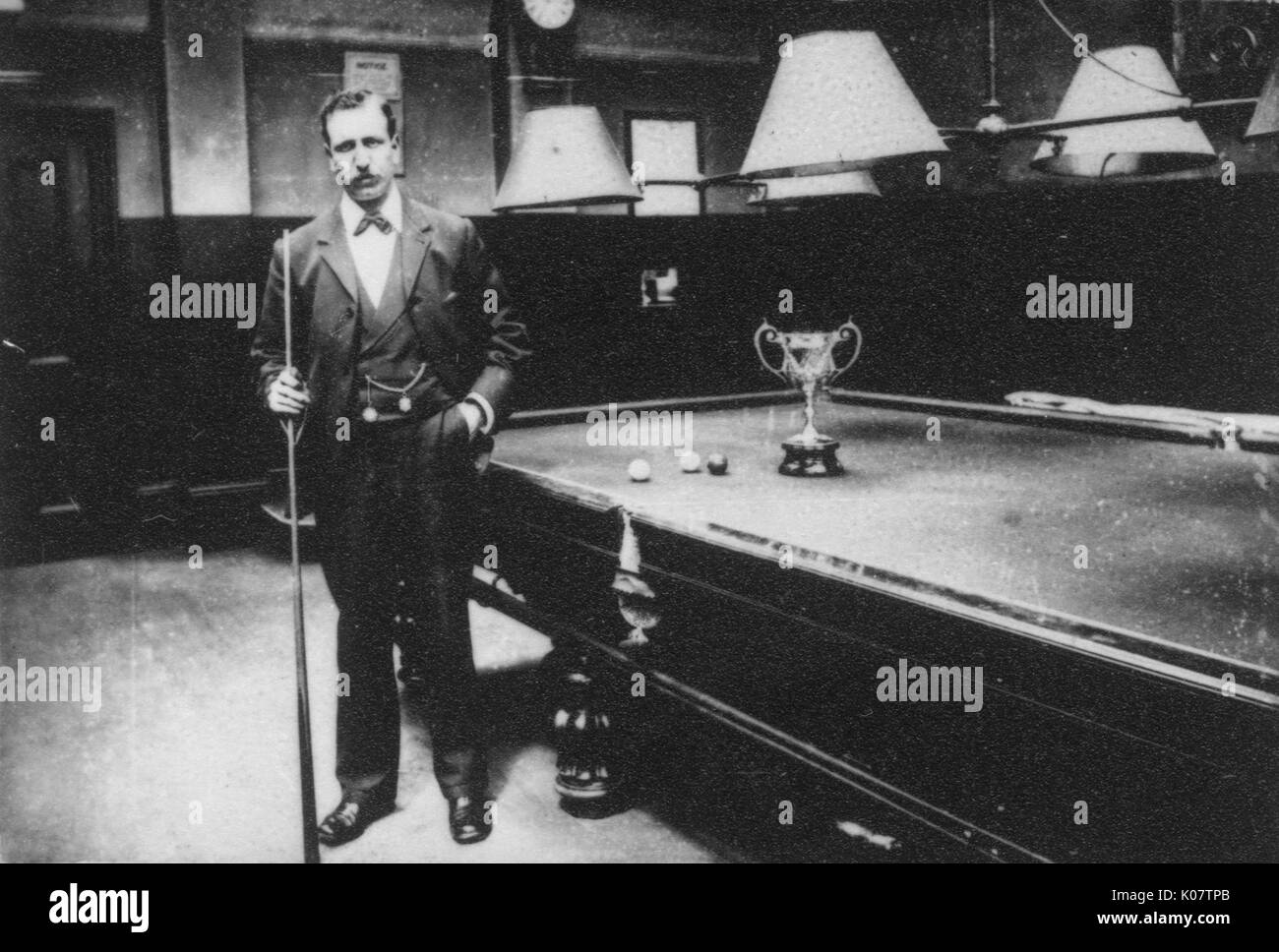 Billiards champion with trophy Stock Photo - Alamy