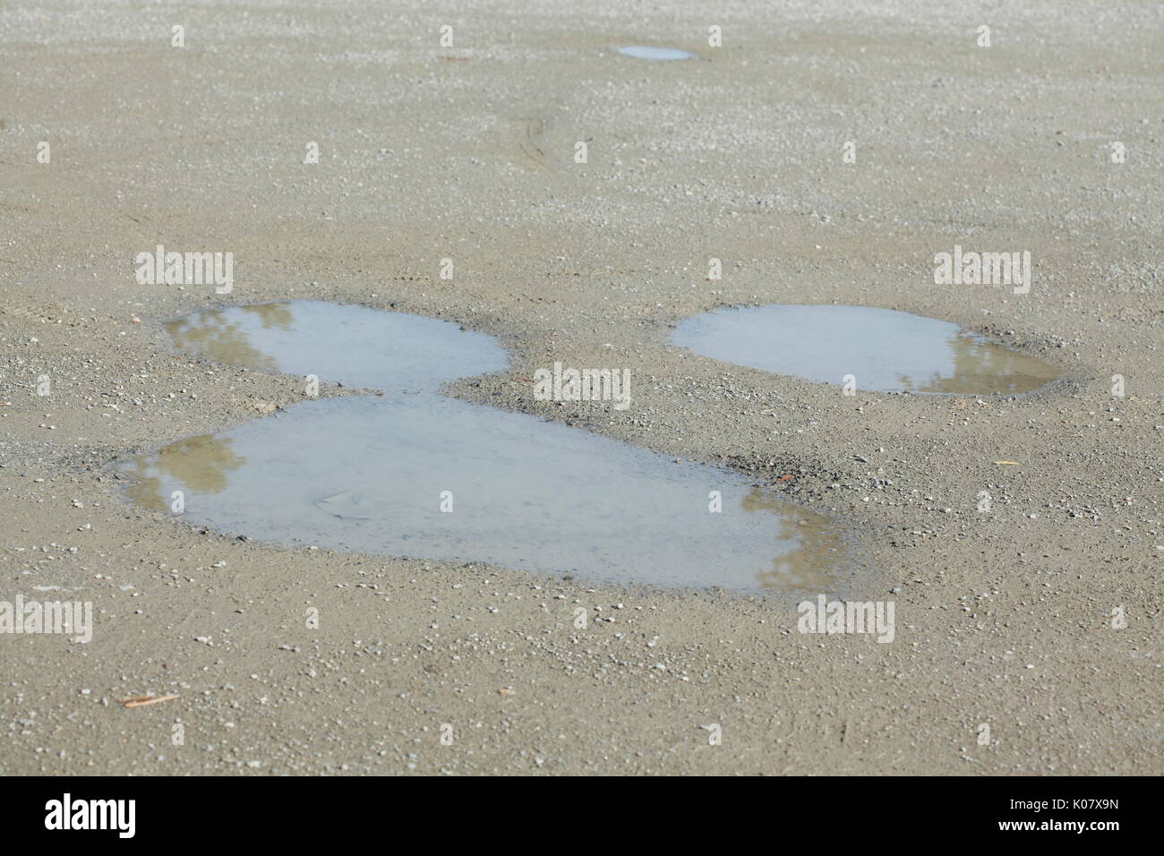 Rain puddles hi-res stock photography and images - Alamy