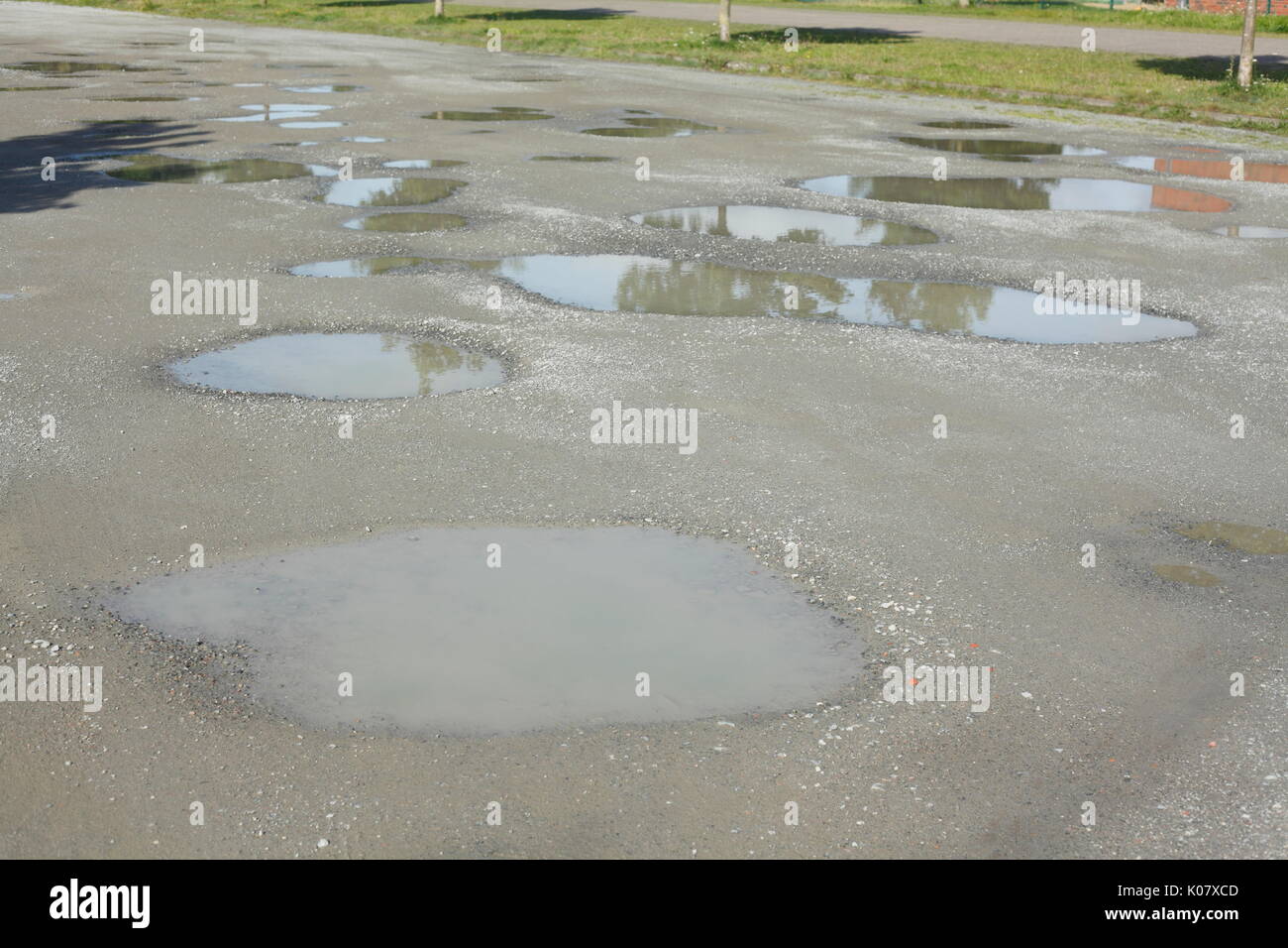 rain puddles on a pad Stock Photo - Alamy