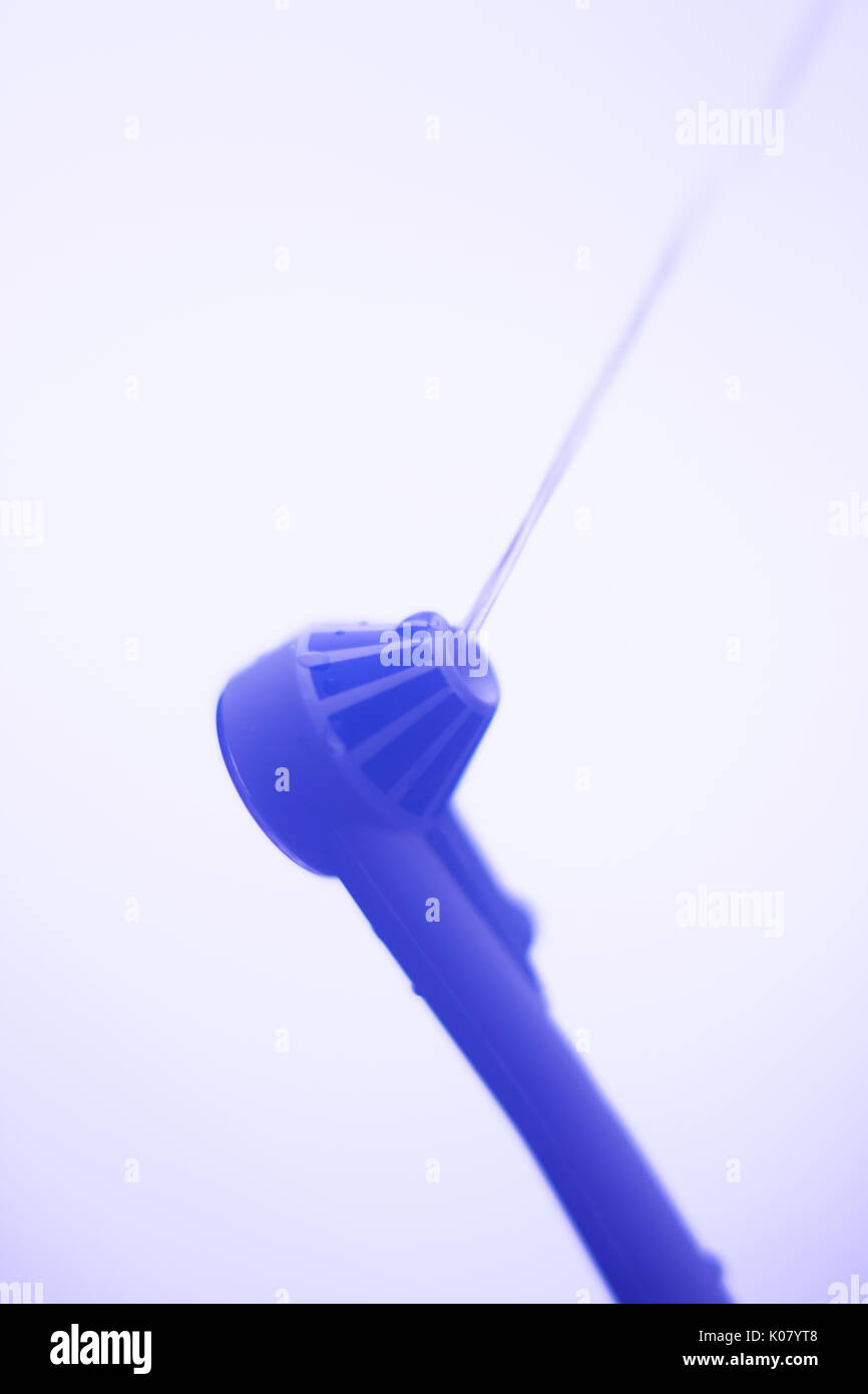 Dental water spray cleaner for interdental hygiene Stock Photo - Alamy