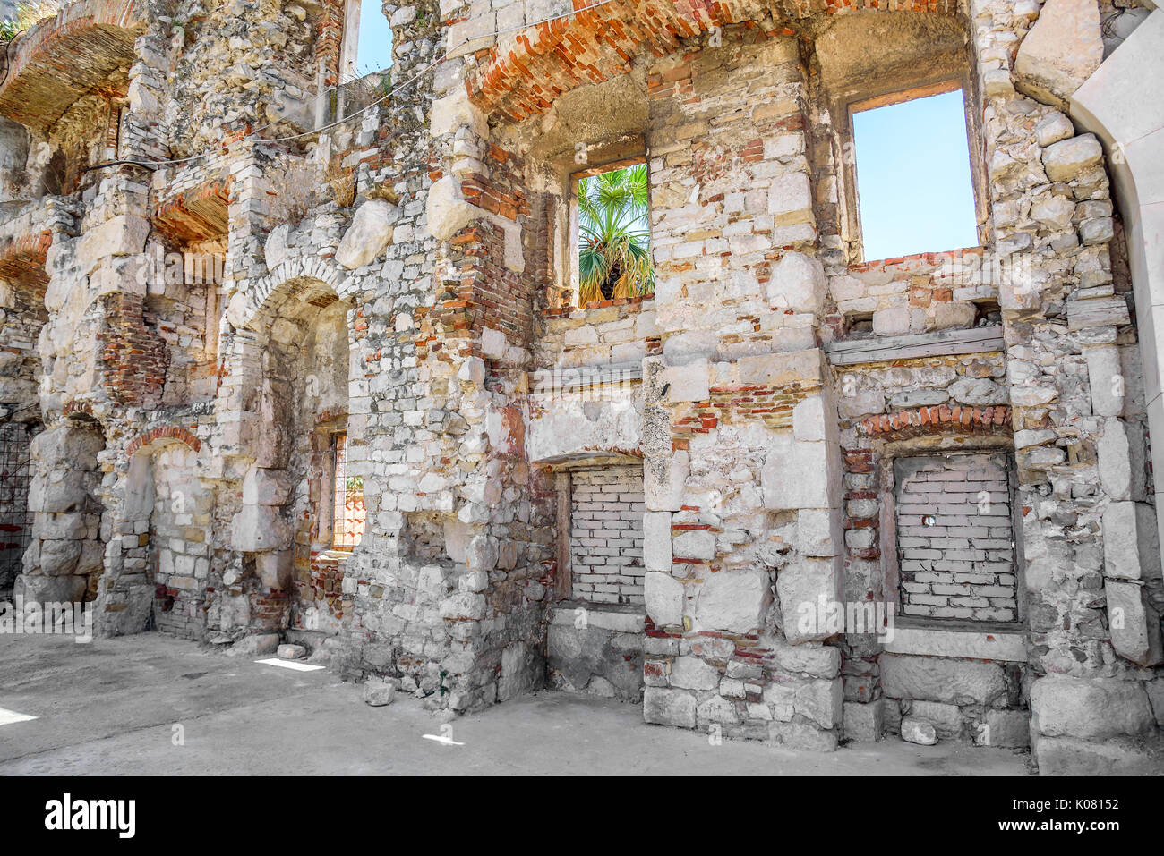 The ruins of an old wall with windows. Split Stock Photo - Alamy