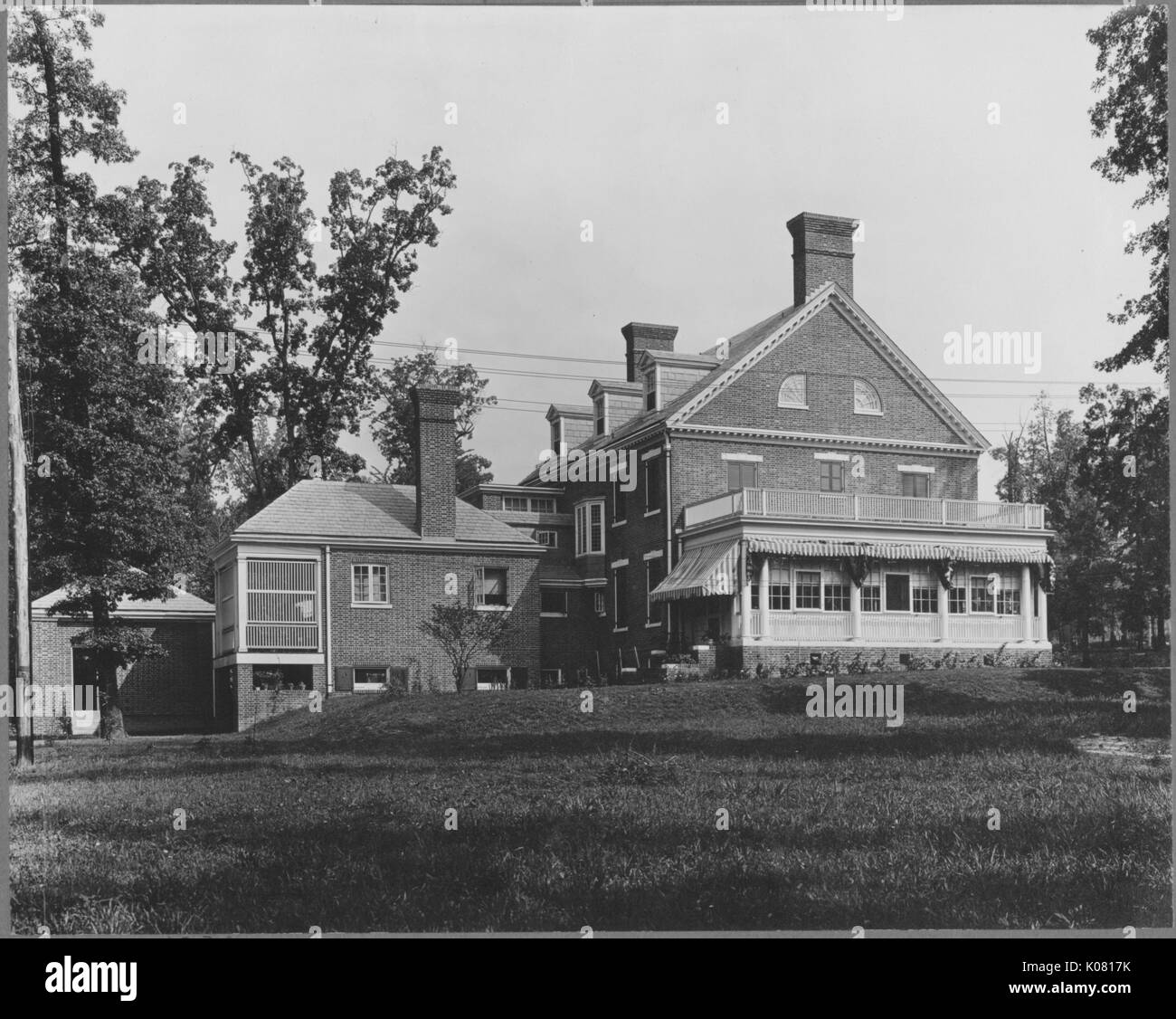 Photograph of the side of a Roland Park home that is three-stories ...