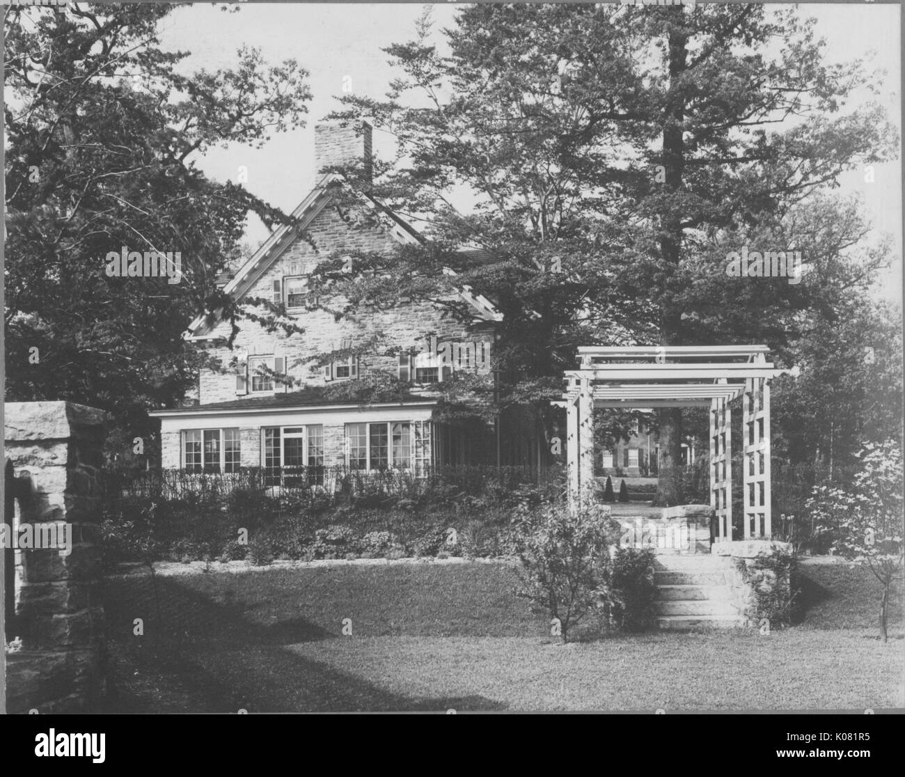 Photograph of a Roland Park home in Baltimore with a beautiful garden ...