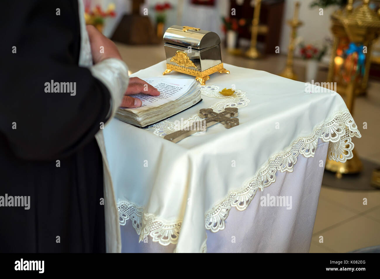 Orthodox christian priest performs rite Stock Photo - Alamy