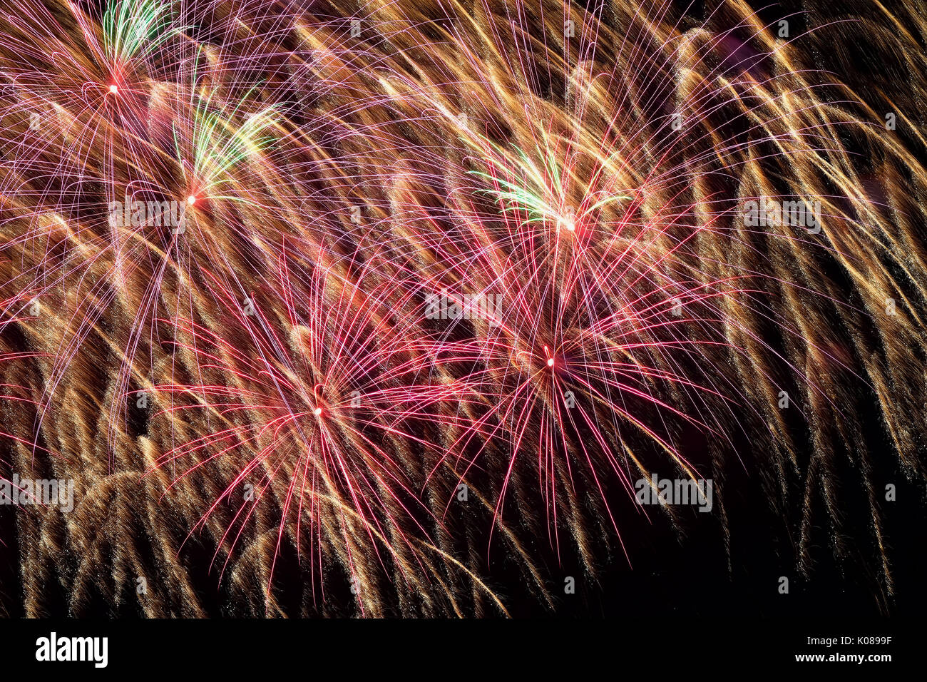Bright flowing stream of fireworks. Colored Elegant background for all ...