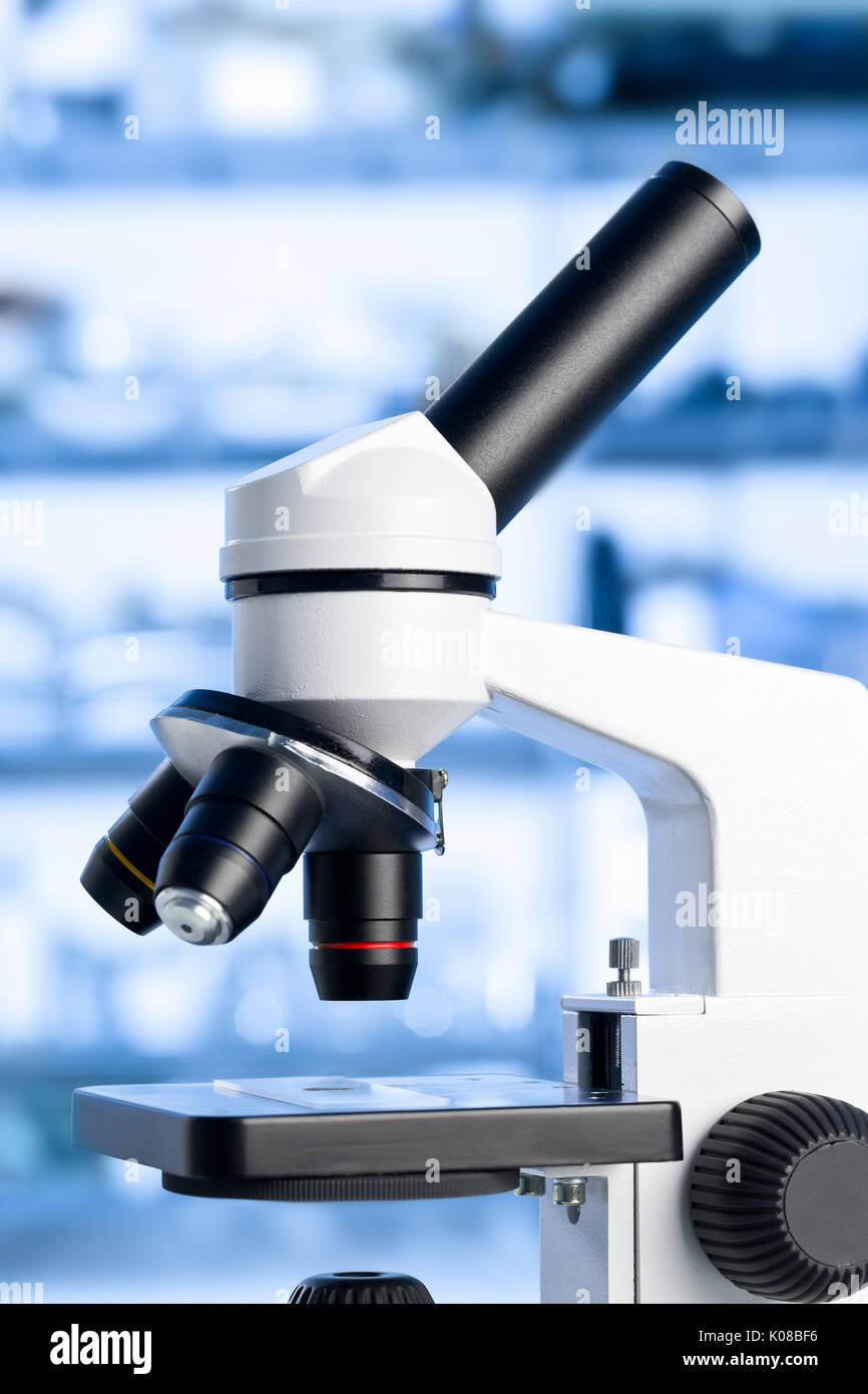 Microscope with sample with out of focus blue lab background Stock ...