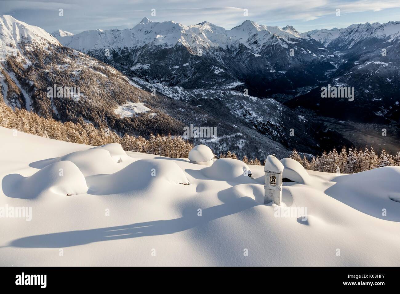 Italy, Italian Alps, Lombardy, The huts and the bell tower of Alpe Cima ...