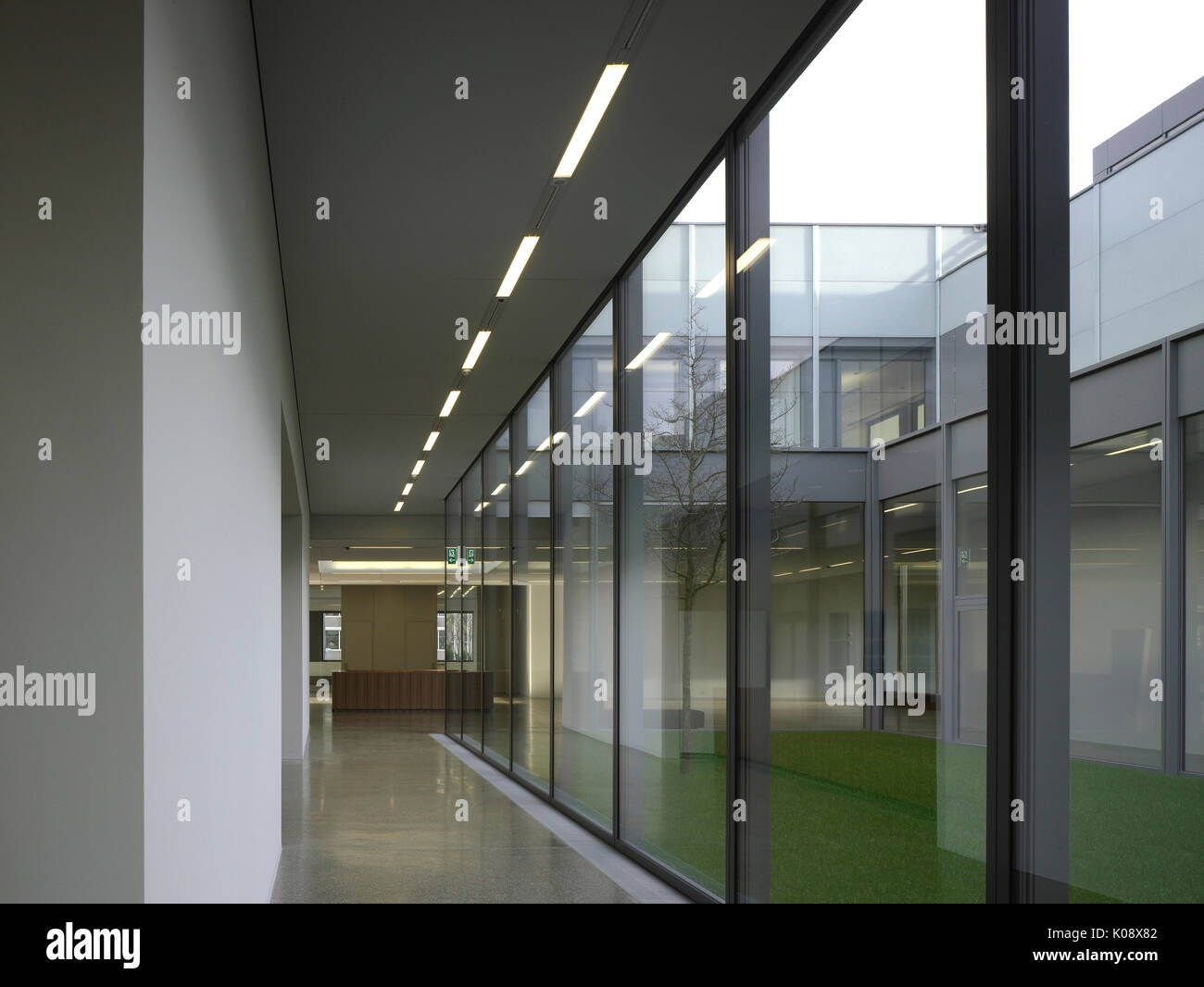 Glazed corridor with courtyard towards entrance lobby. Museum Folkwang ...