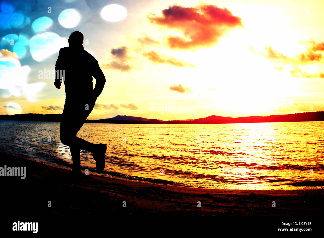 Film grain effect. Silhouette of sport active man running and ...