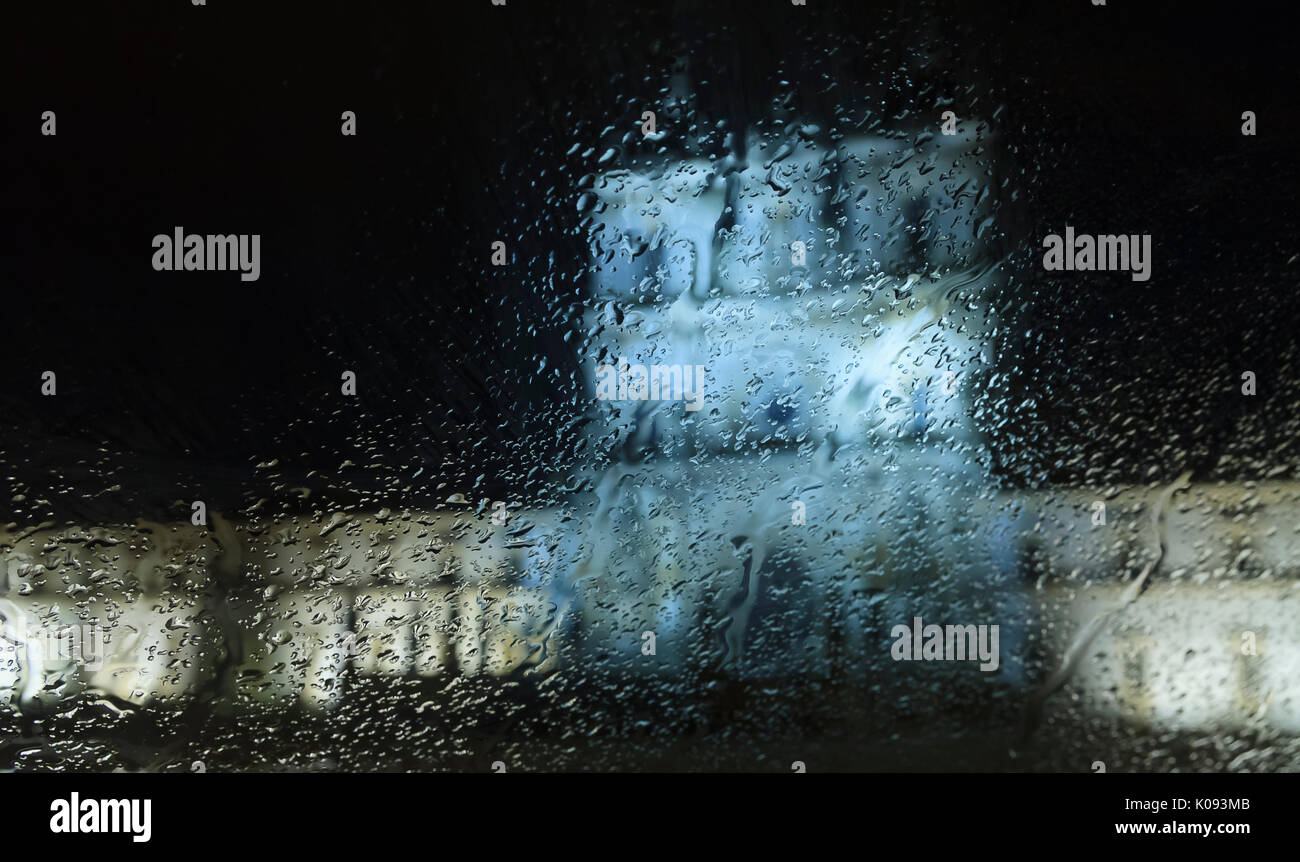 Facade of the Monastery of Alcobaca seen thru a car window glass in the ...