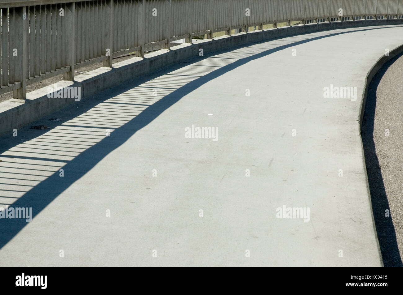 sidewalk at curved bridge Stock Photo - Alamy