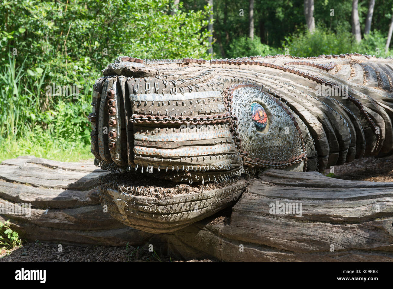 A carved wooden sea monster sculpture in Tilgate Park, Crawley, West ...