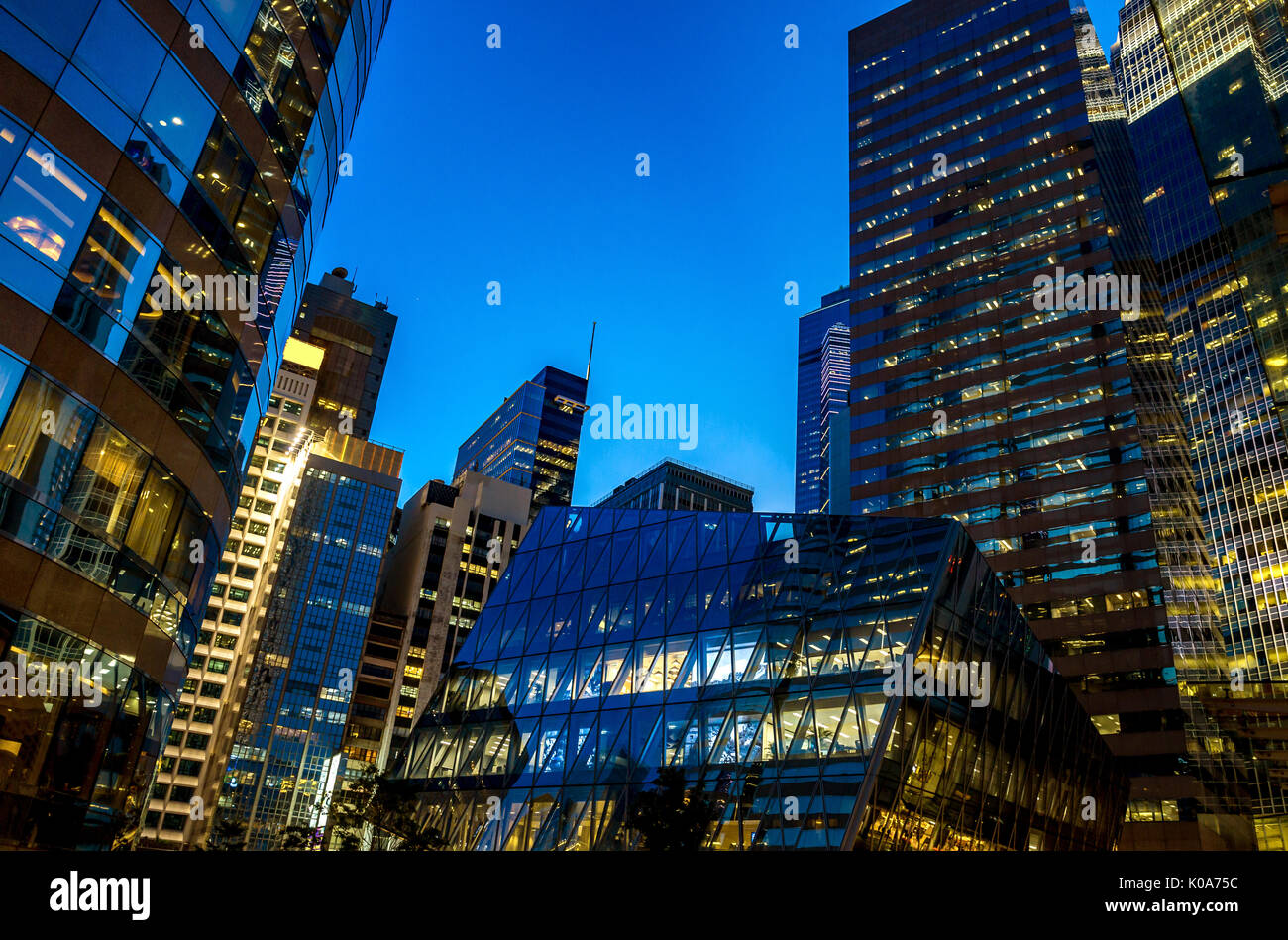 Commercial buildings at night in Hong Kong Stock Photo - Alamy
