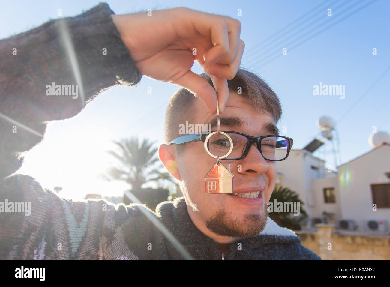 Man handing house keys shaped hi-res stock photography and images - Alamy