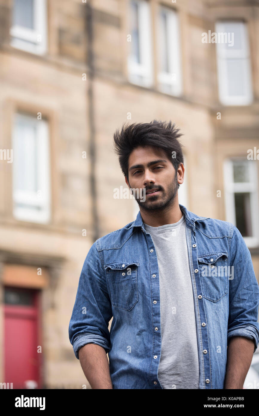 Indian man standing hi-res stock photography and images - Alamy