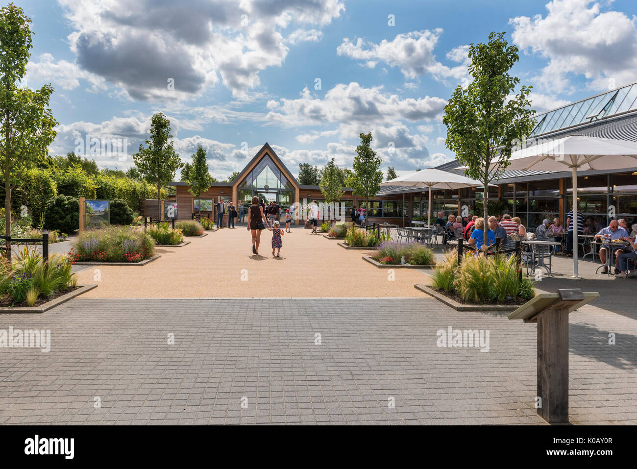 Approach to the entrance to RHS Hyde Hall, with cafe on the right hand ...