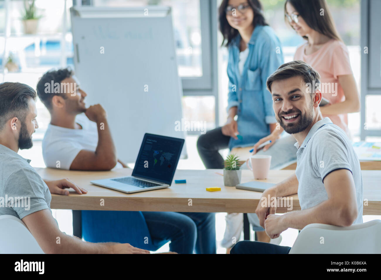 Handsome bearded man looking at you Stock Photo - Alamy