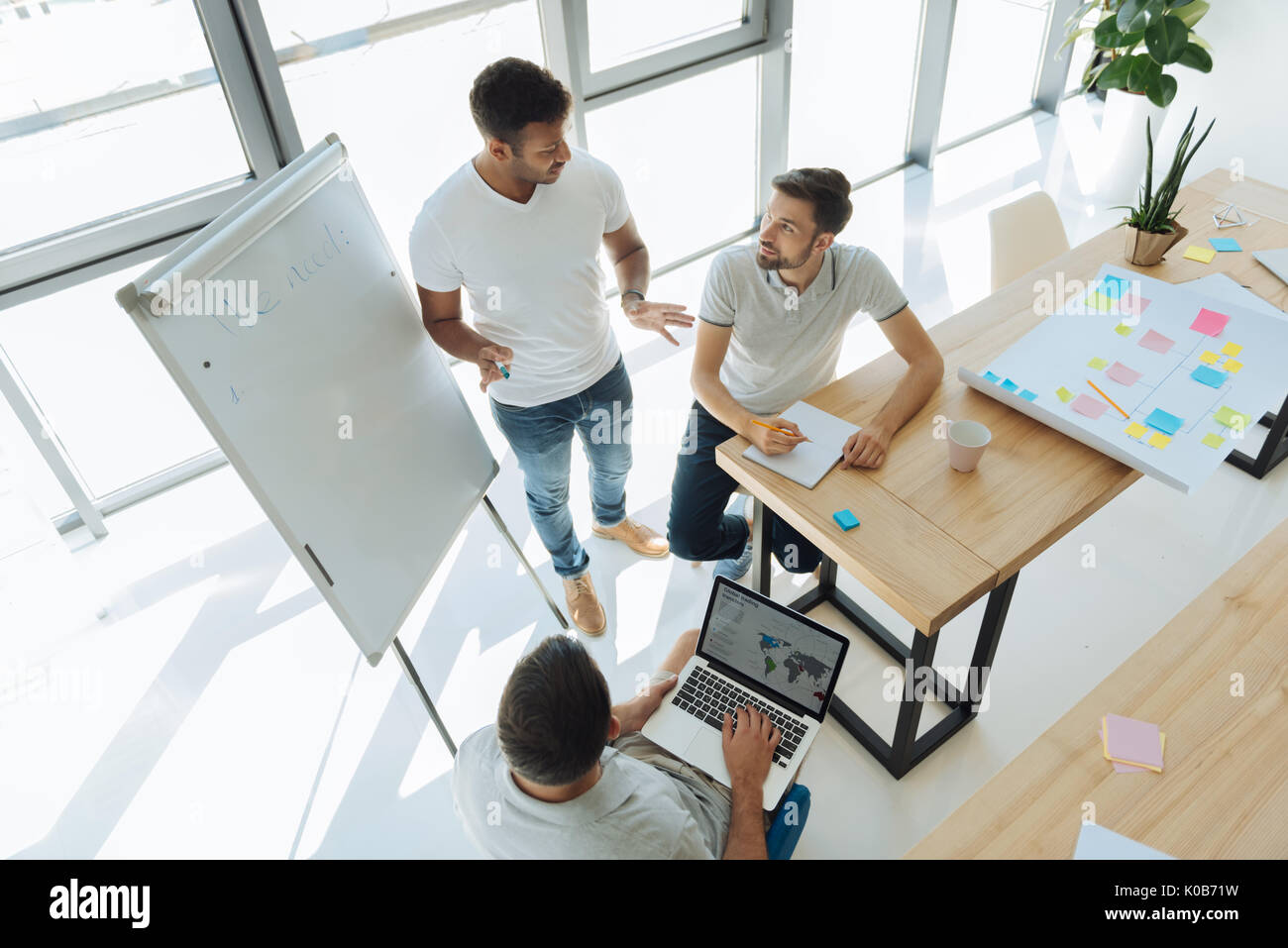 Smart clever man explaining the concept Stock Photo - Alamy