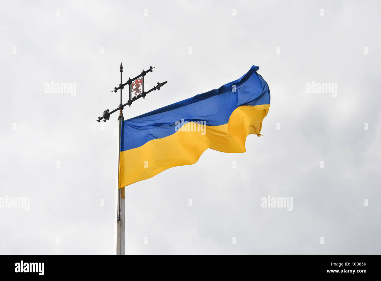 Close up of old Ukranian flag waving on the wind over the hill of Lviv ...
