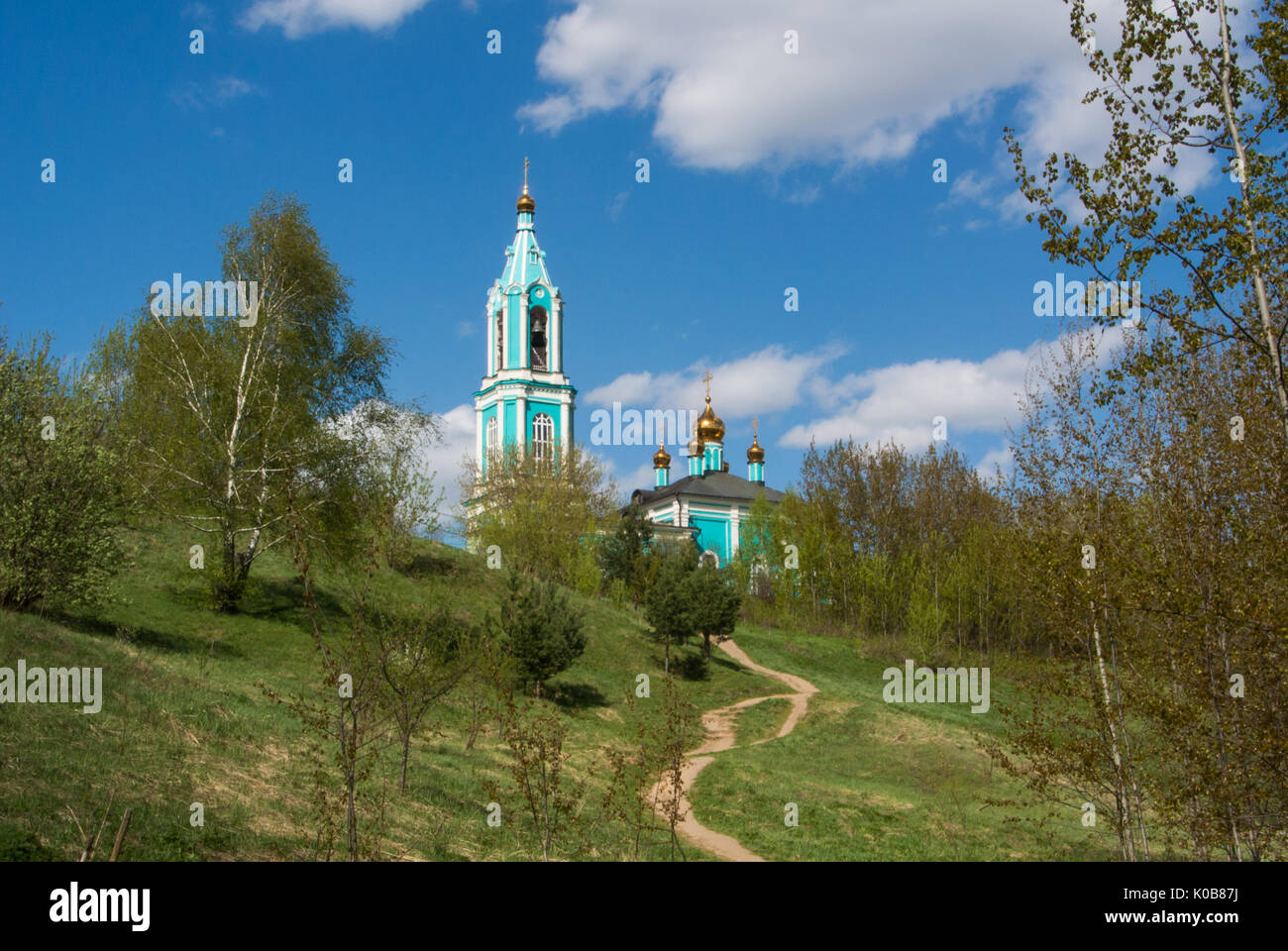Canonic view of small russian ortodox church over the hill, beautiful ...