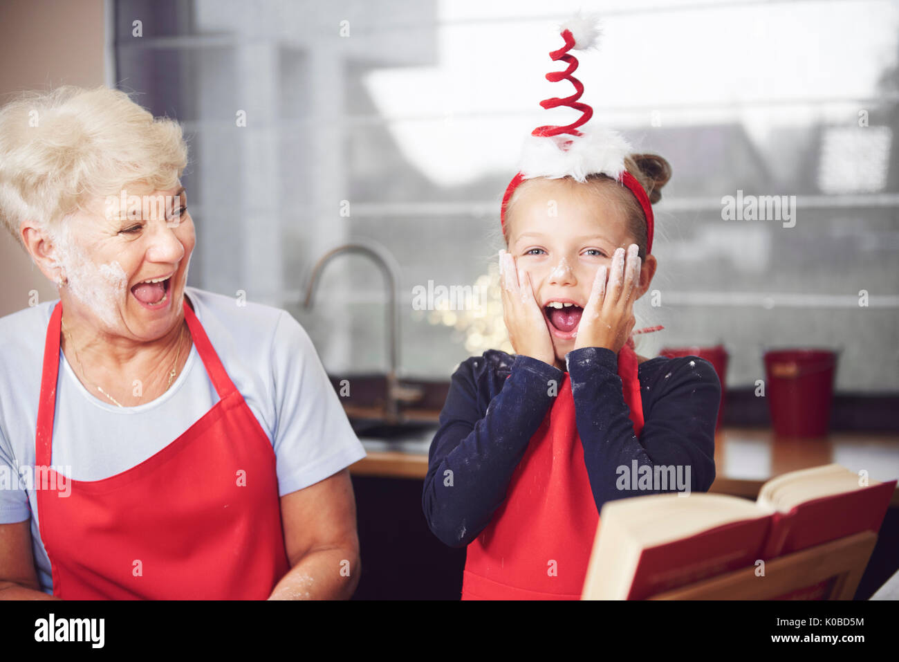 Grandmother with child having a fun Stock Photo - Alamy